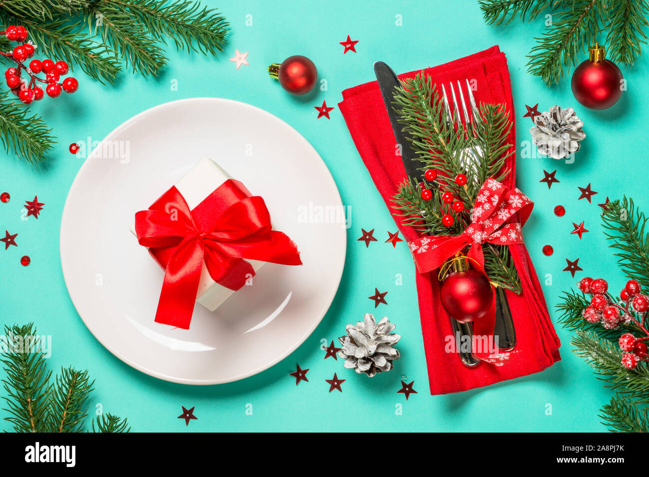 Christmas table setting with decorations top view Stock Photo - Alamy