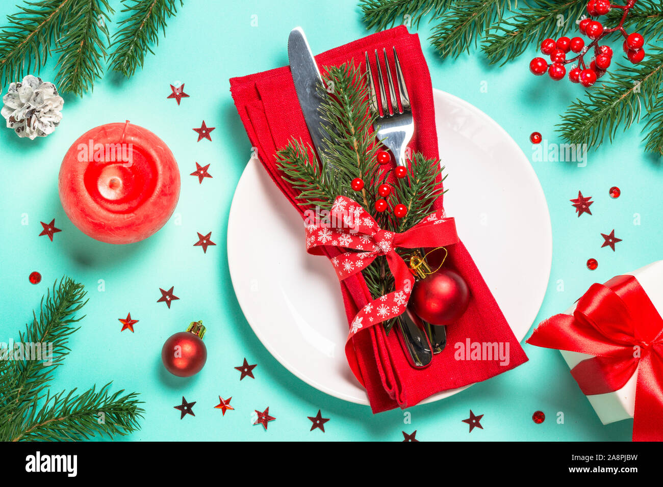 Christmas table setting with decorations top view Stock Photo - Alamy