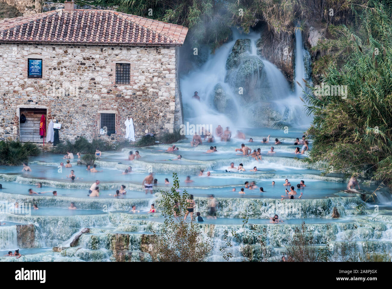 Natural spa with waterfalls and hot springs at Saturnia thermal baths ...