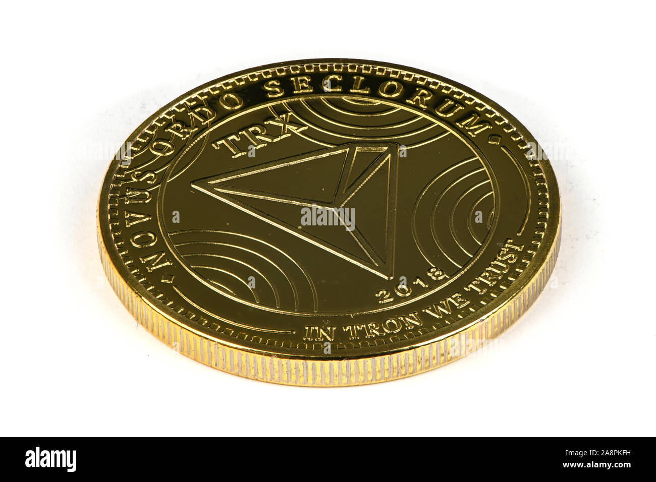 Back side of the crypto currency golden tron isolated on white ...
