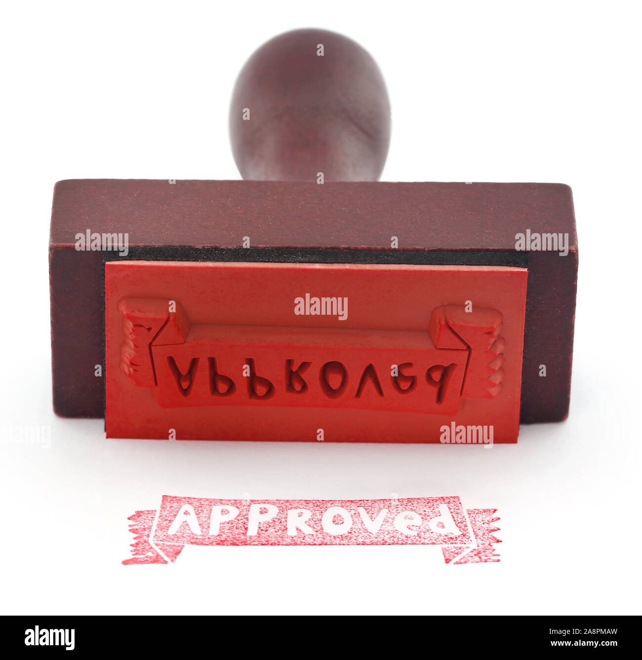 Approved text with rubber stamp over white Stock Photo - Alamy