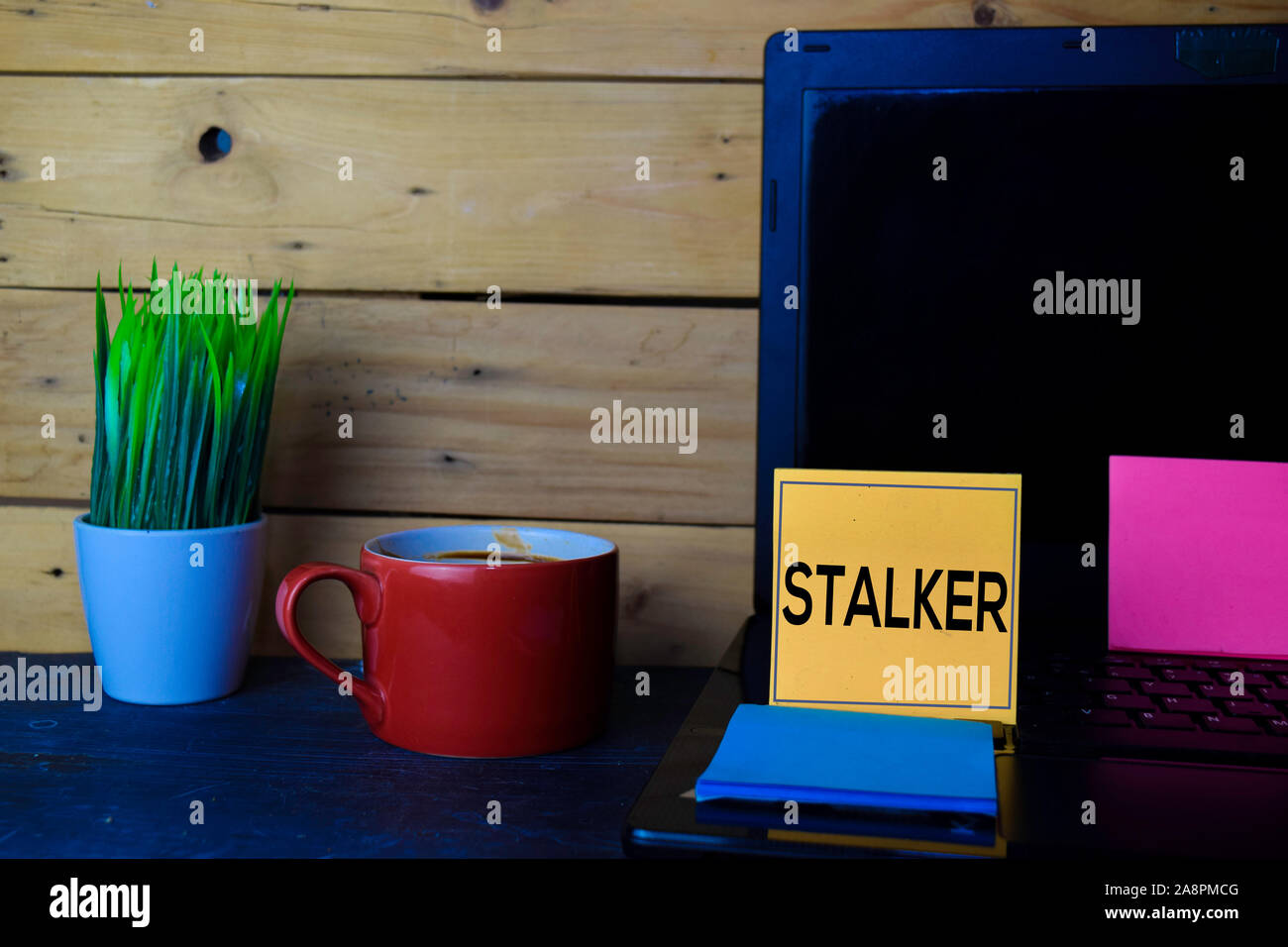 Stalker write on sticky note isolated white background Stock Photo - Alamy
