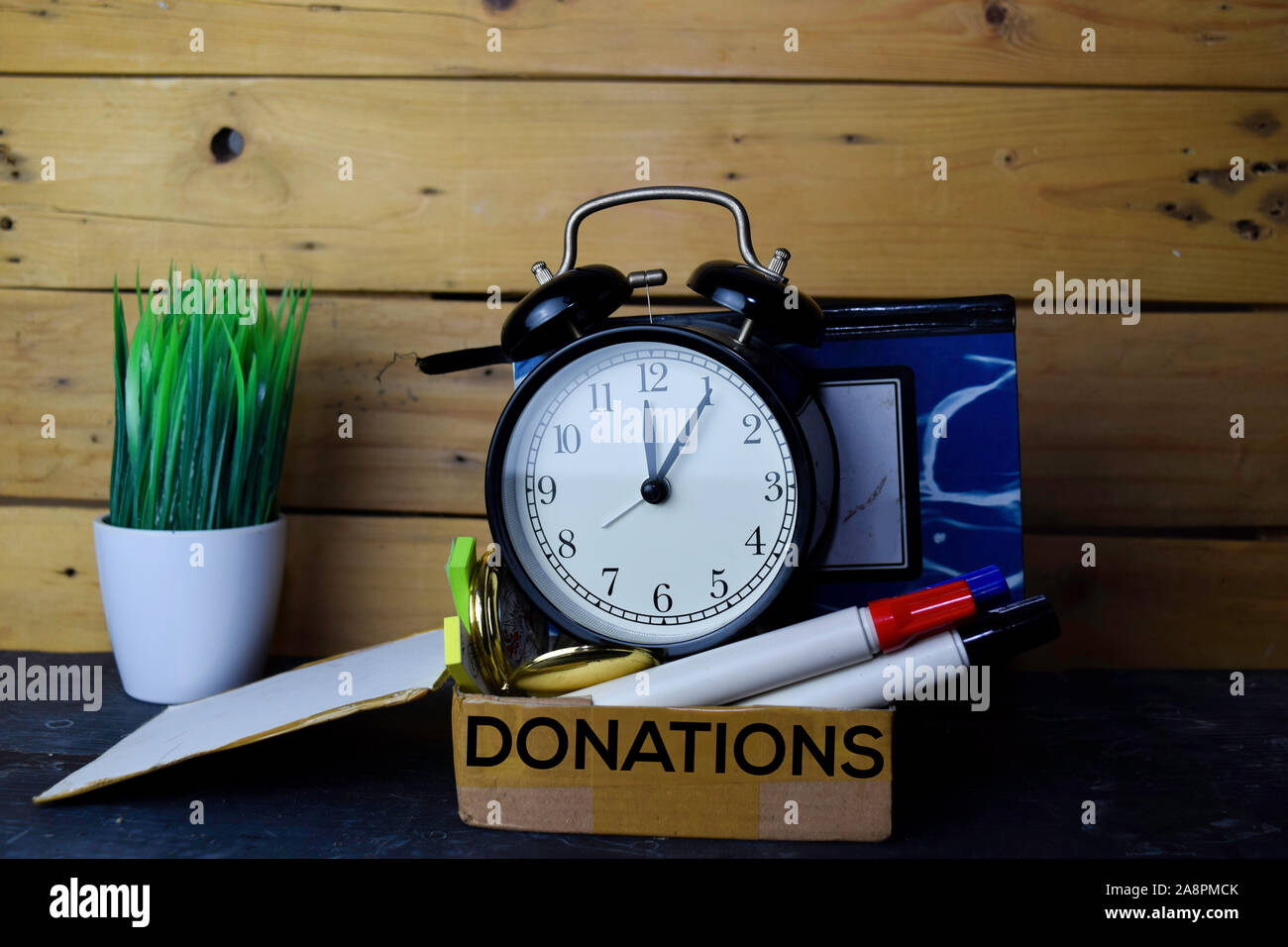 Stationery or Equipment for school in Boxes on wooden table. Donations ...