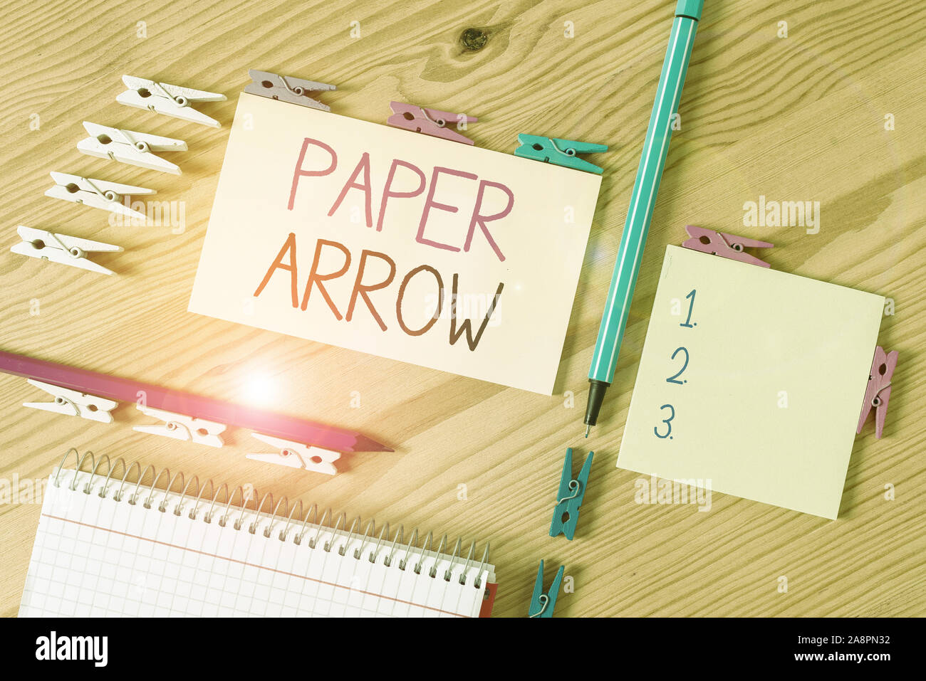 Writing note showing Paper Arrow. Business concept for Business ...