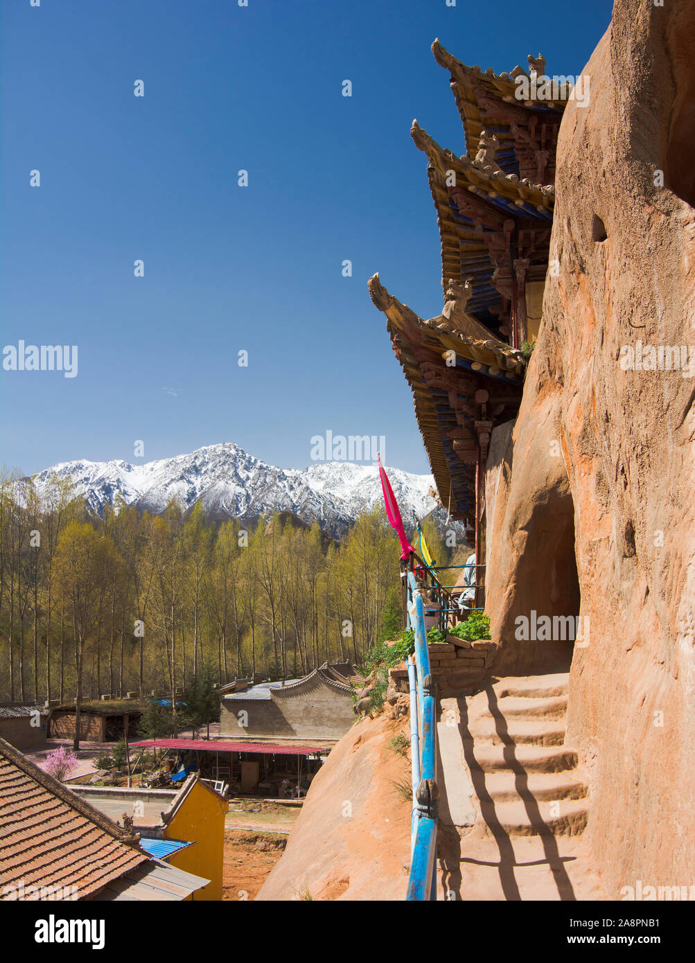 Caves carved into the cliff's face at the buddhist monastery of Mati Si ...
