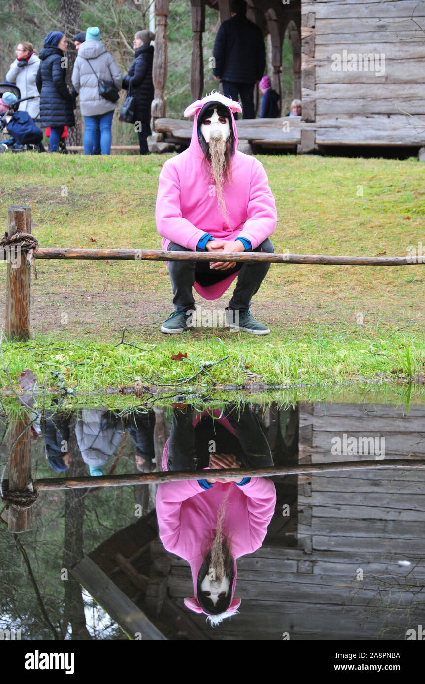 Riga, Latvia. 10th Nov, 2019. A man in traditional Latvian mask is seen ...