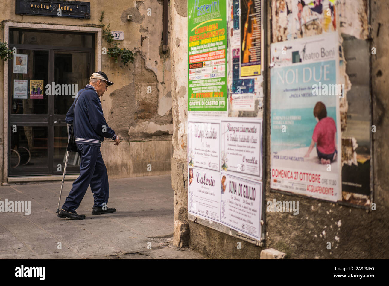 Local people in the street of the village Pitigliano, Tuscany, Italy ...