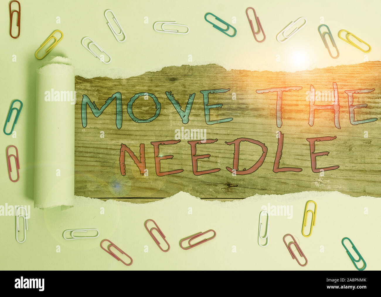 Writing note showing Move The Needle. Business concept for Make a ...