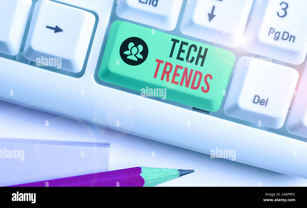Writing note showing Tech Trends. Business concept for technology that ...