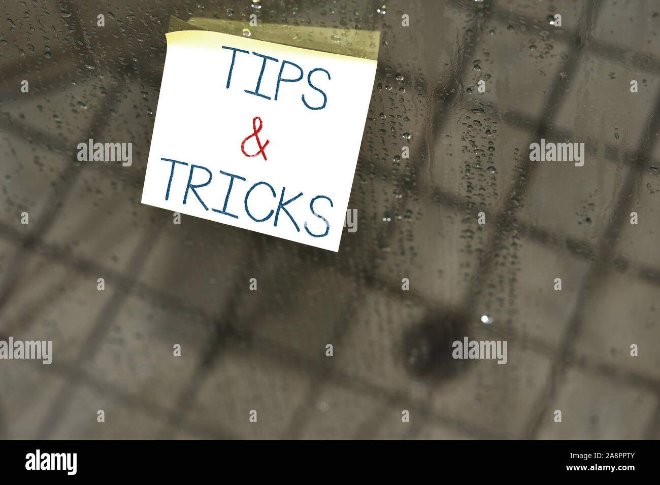 Writing note showing Tips And Tricks. Business concept for Steps ...