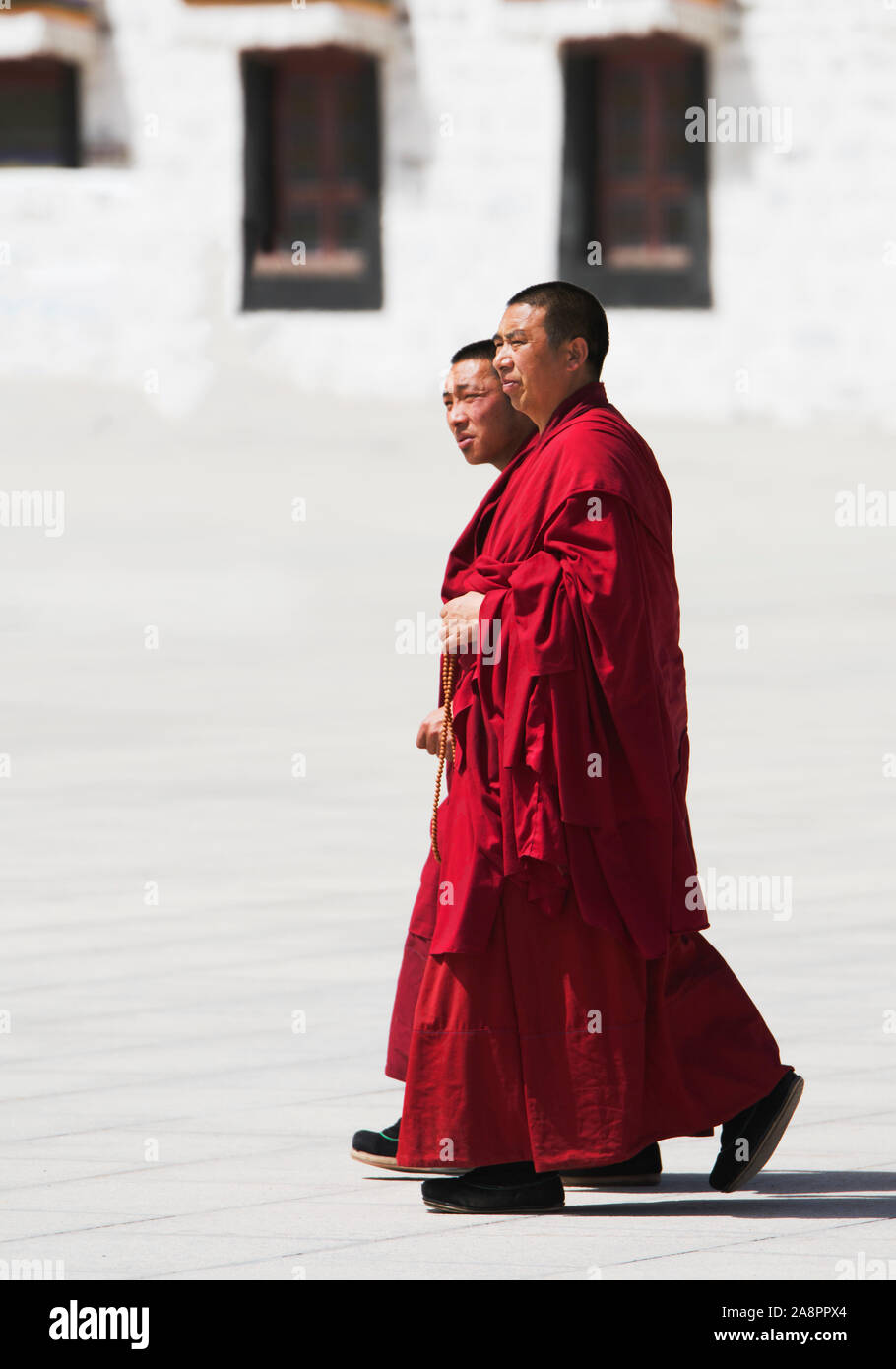 Monks at the streets of Labrang Monastery, China Stock Photo - Alamy