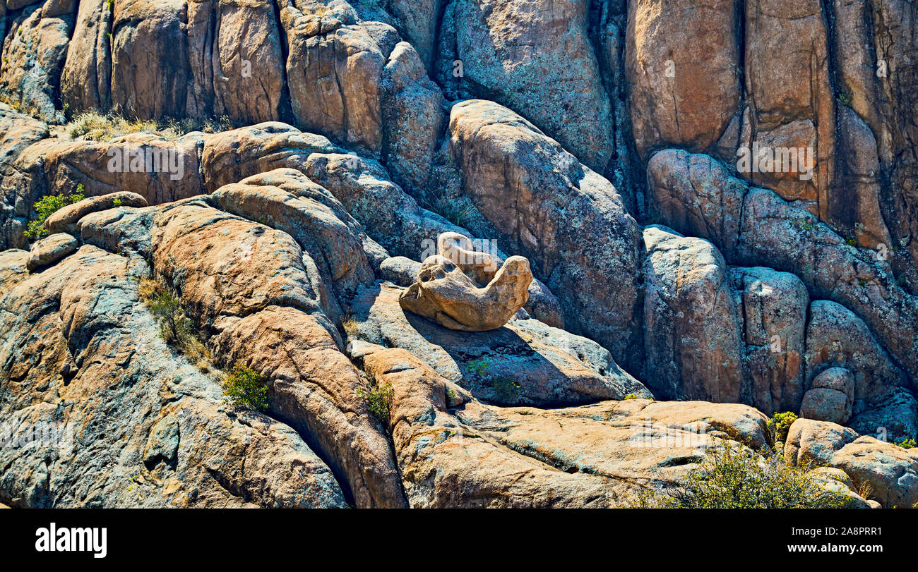 Unusual natural rock formation sitting on larger boulders Stock Photo ...