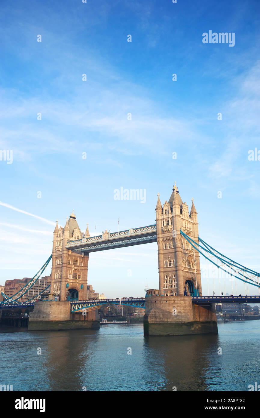 Scenic daytime view of Tower Bridge crossing the River Thames in London ...