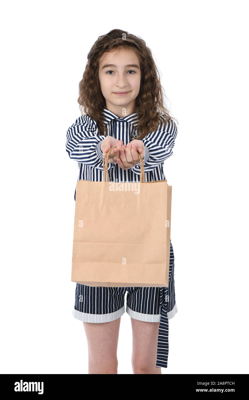 Child with a packet isolated on white background. Kid happy shopping in ...
