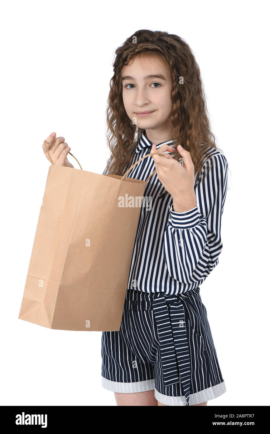 Child with a packet isolated on white background. Kid happy shopping in ...