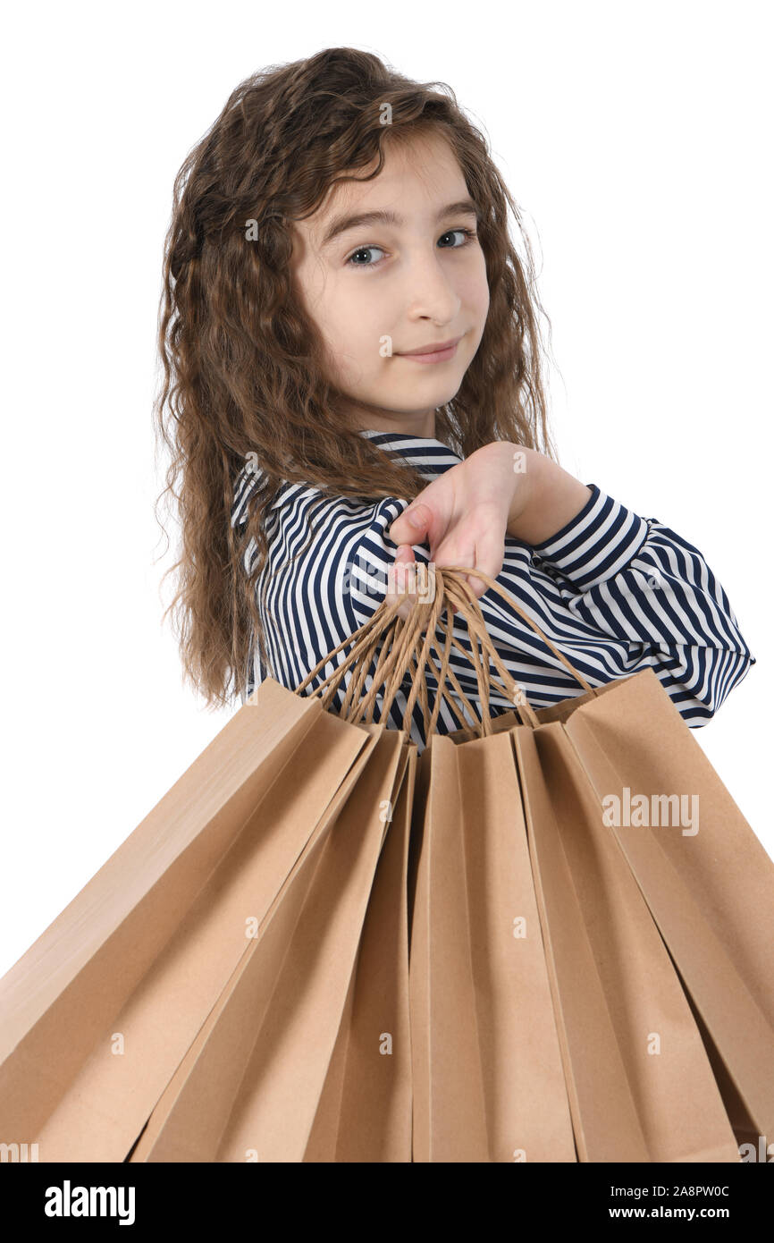 Child with a packet isolated on white background. Kid happy shopping in ...