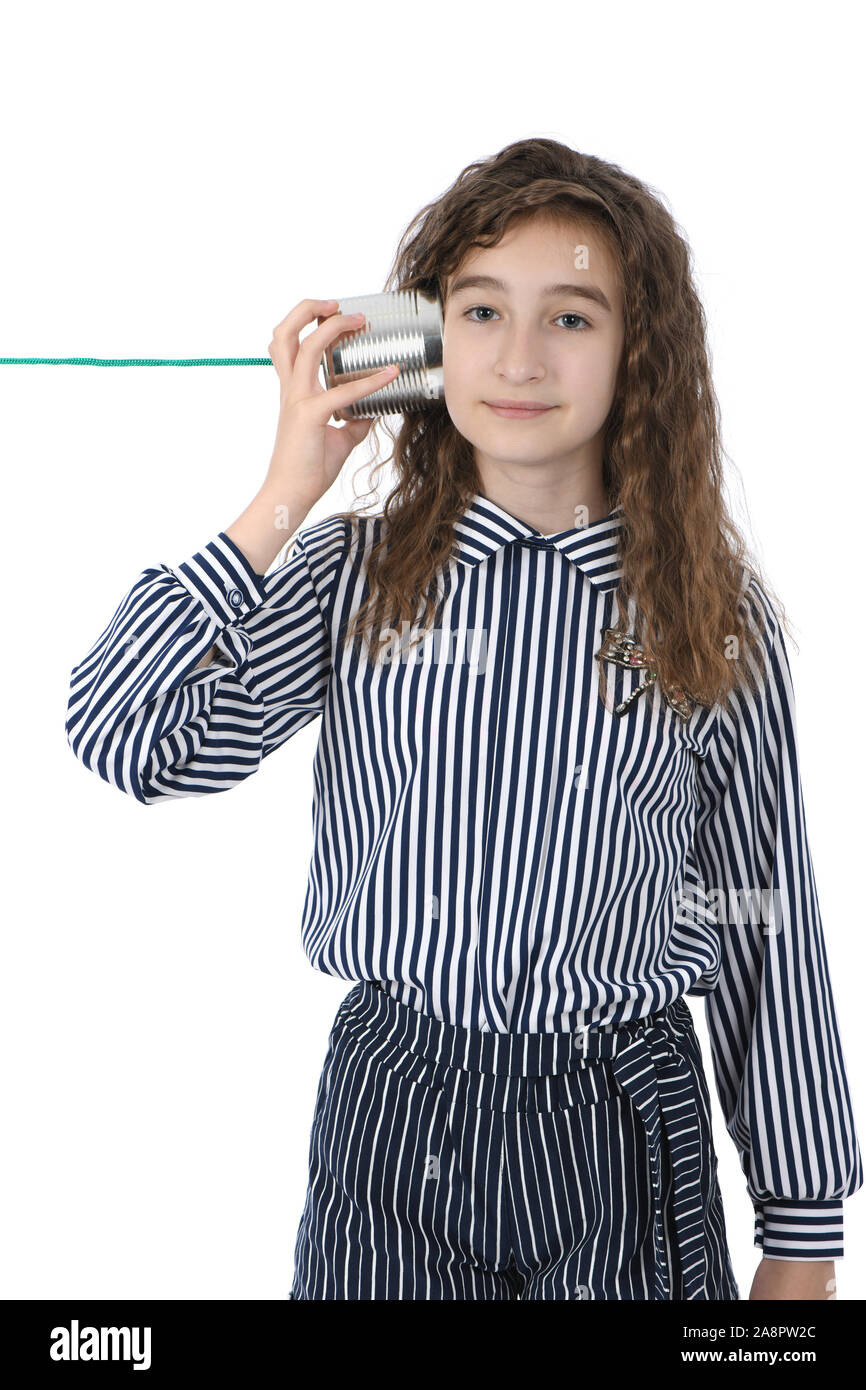 Young girl call by tin can phone isolated on white. High resolution ...