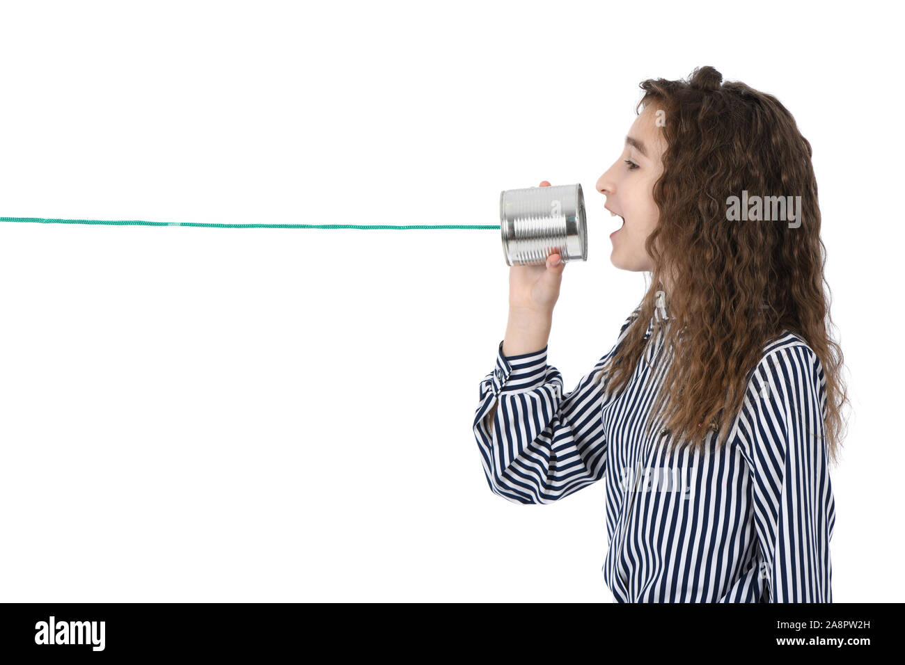 Young girl call by tin can phone isolated on white. High resolution ...