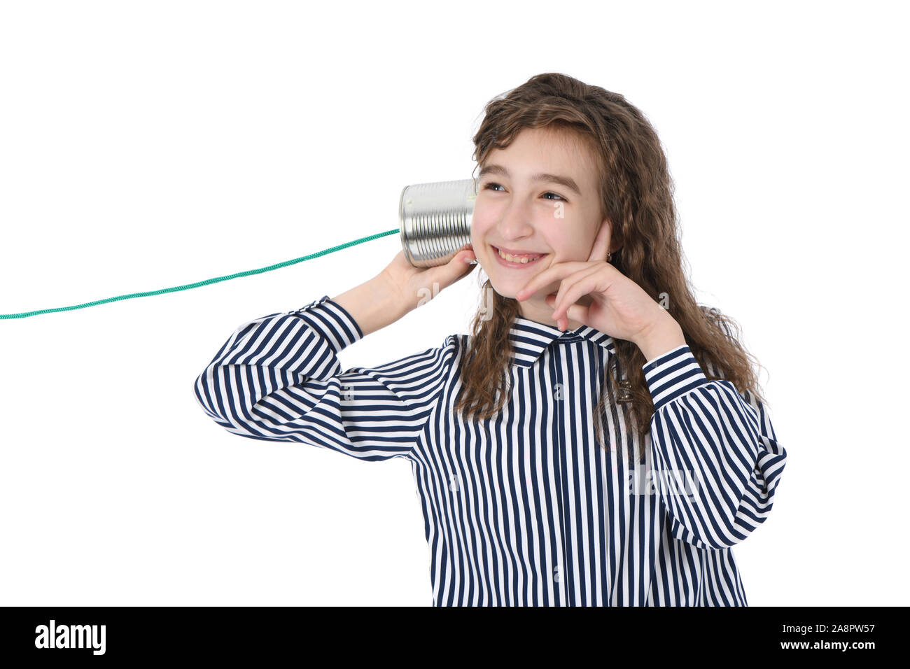 Young girl call by tin can phone isolated on white. High resolution ...