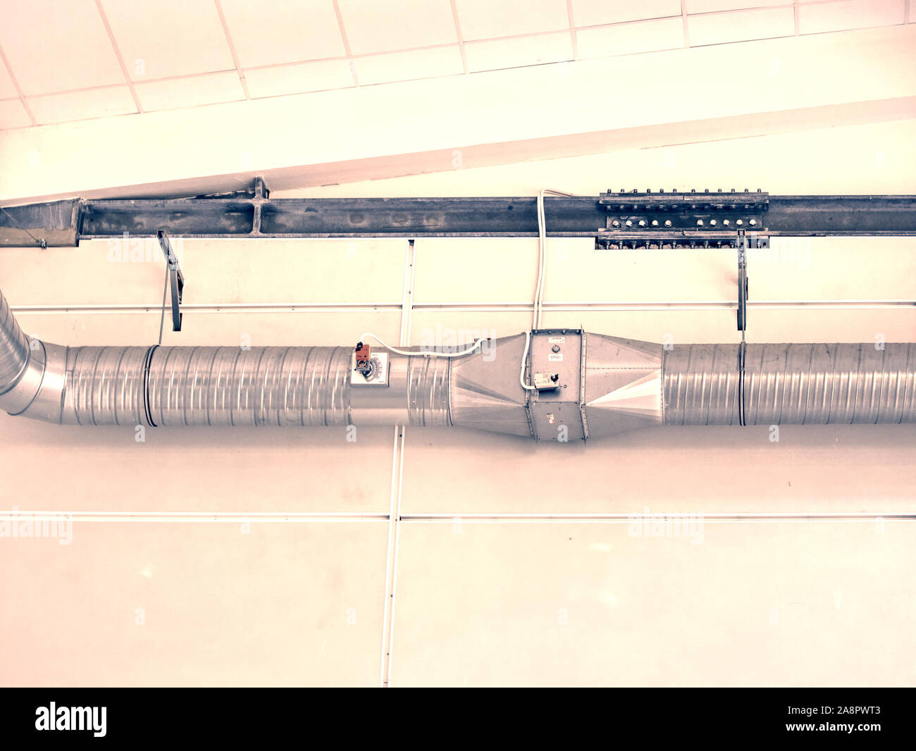 Air duct, wiring and plumbing in the mall. Air conditioner pipe, wiring ...