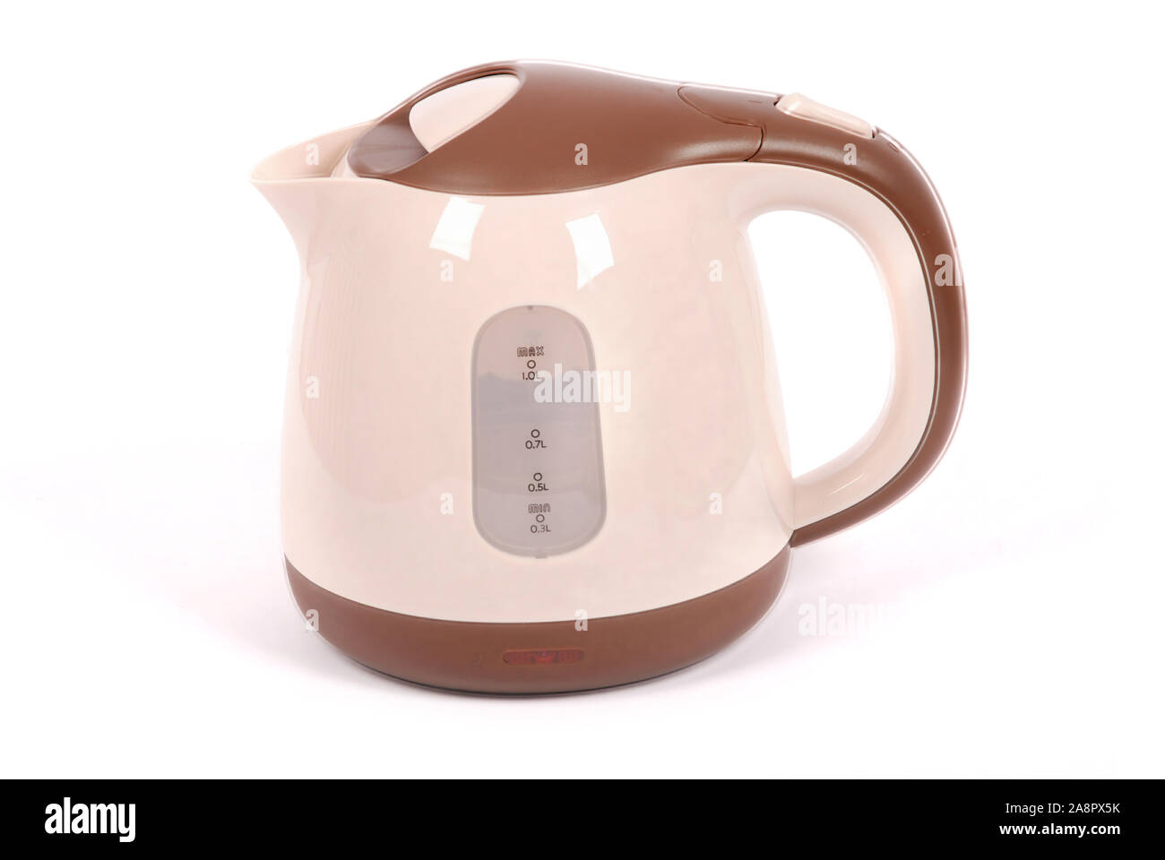 Electric kettle, isolated on white. Stylish modern beige and brown ...
