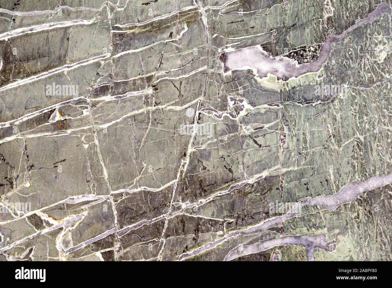 A structure of different stone types as a background Stock Photo - Alamy