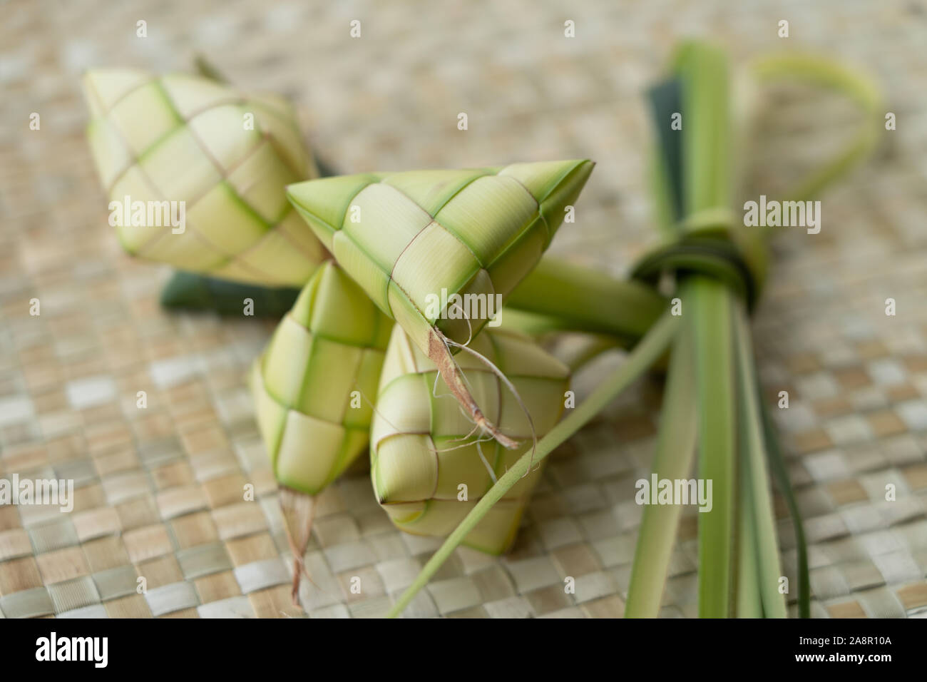 A woven pouch of coconut leaves known as Puso in the Visayas area of ...