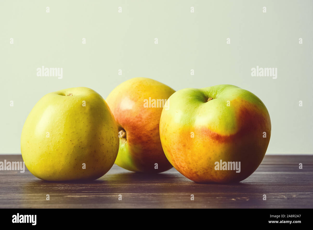 Ripe fruits, apples on a wooden old table. Fruit still life Stock Photo ...