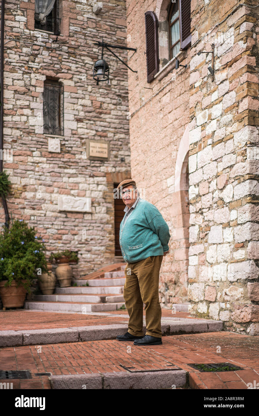 Local people in the street of the Assisi, Umbria, Italy Stock Photo - Alamy