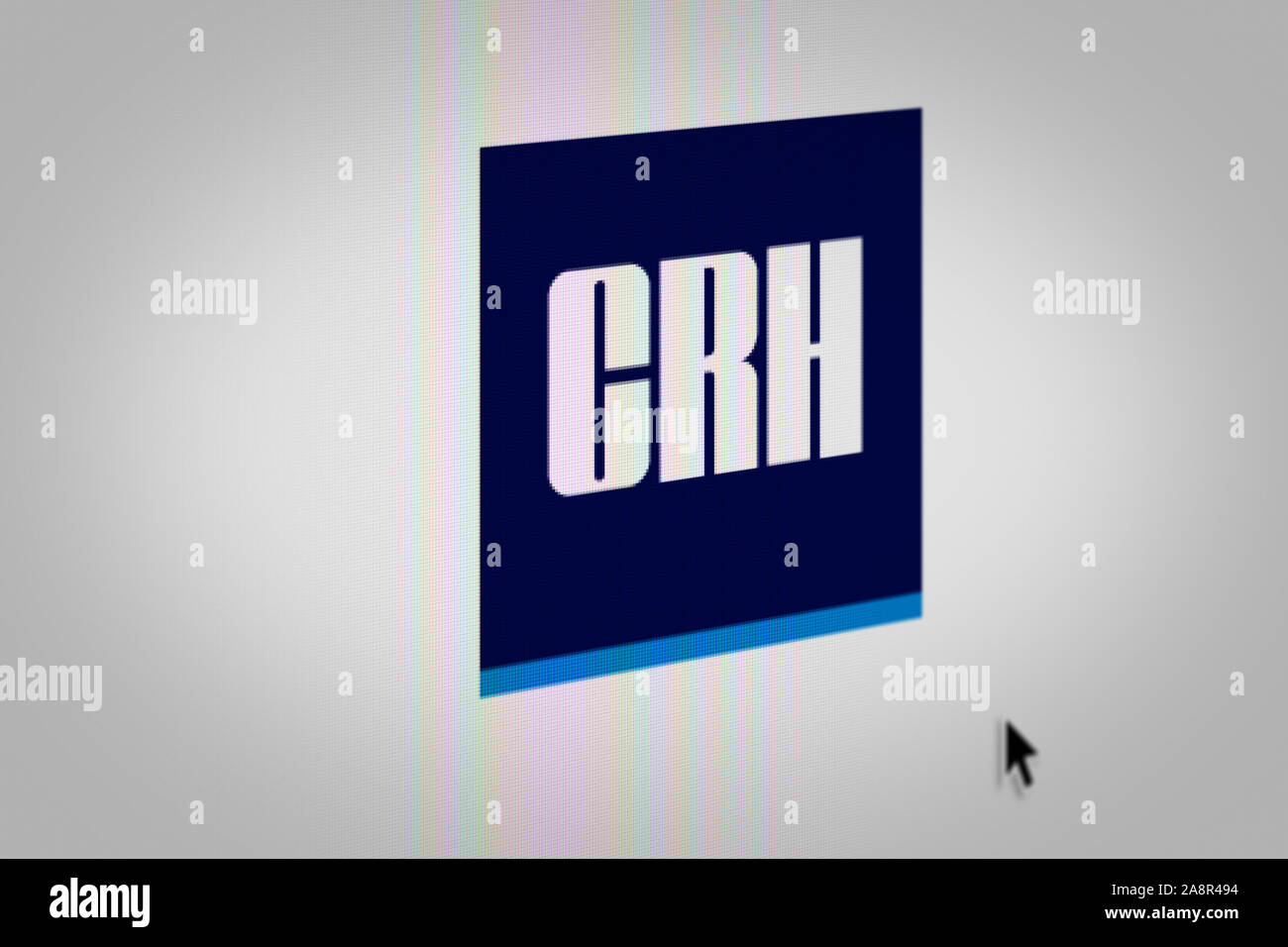 Logo of the public company CRH plc displayed on a computer screen in ...