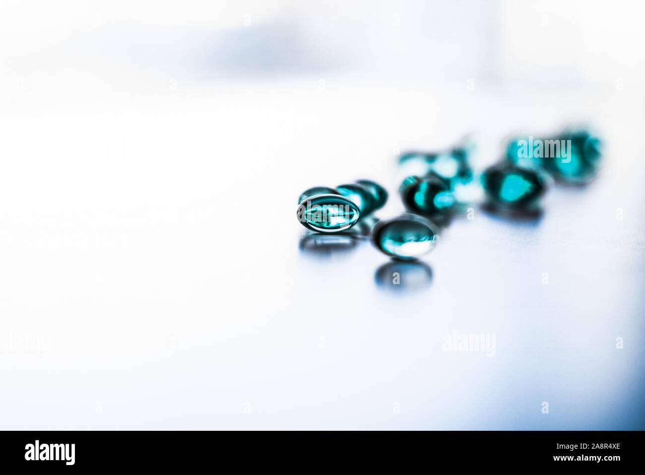 Pharmaceutical, branding and science concept - Blue pills for healthy ...