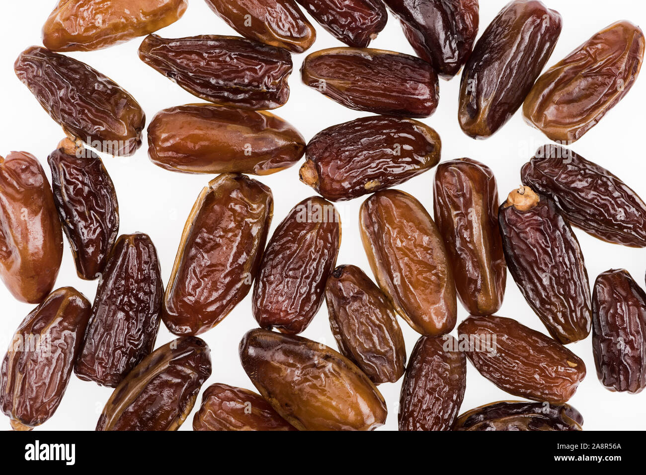 top view of tasty dried dates isolated on white Stock Photo - Alamy