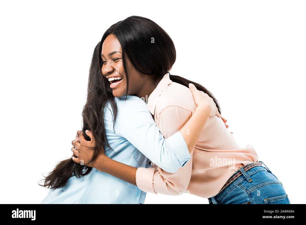 back view of smiling multiethnic friends hugging isolated on white ...