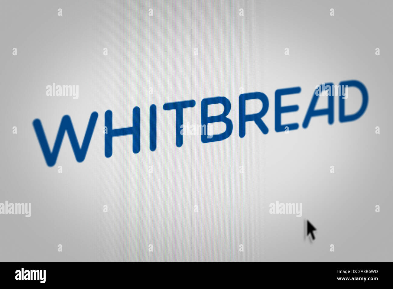 Logo of the public company Whitbread displayed on a computer screen in ...