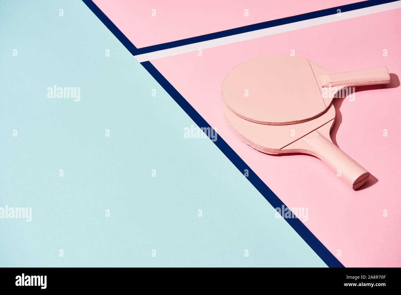 Two tennis rackets on pink and blue background with lines Stock Photo ...