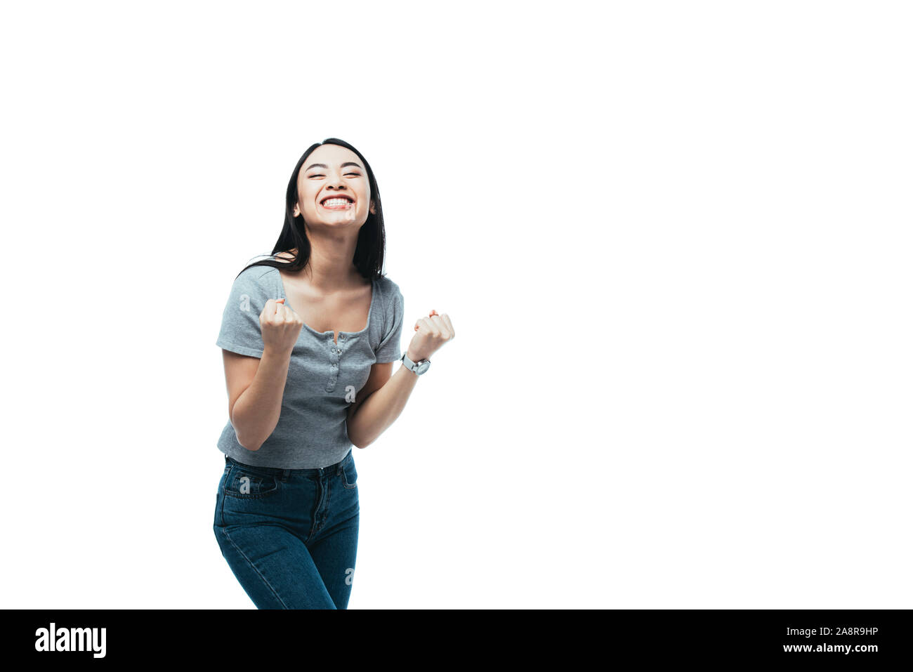 happy asian girl showing yeah gesture isolated on white Stock Photo - Alamy