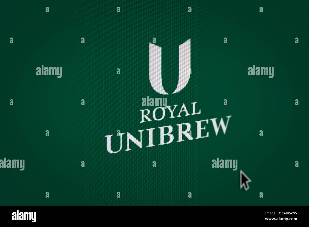 Logo of the public company Royal UNIBREW displayed on a computer screen in close-up. Credit ...
