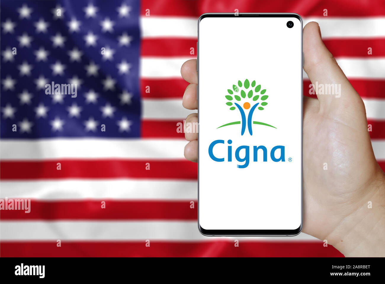 Logo of public company CIGNA Corp. displayed on a smartphone. Flag of ...