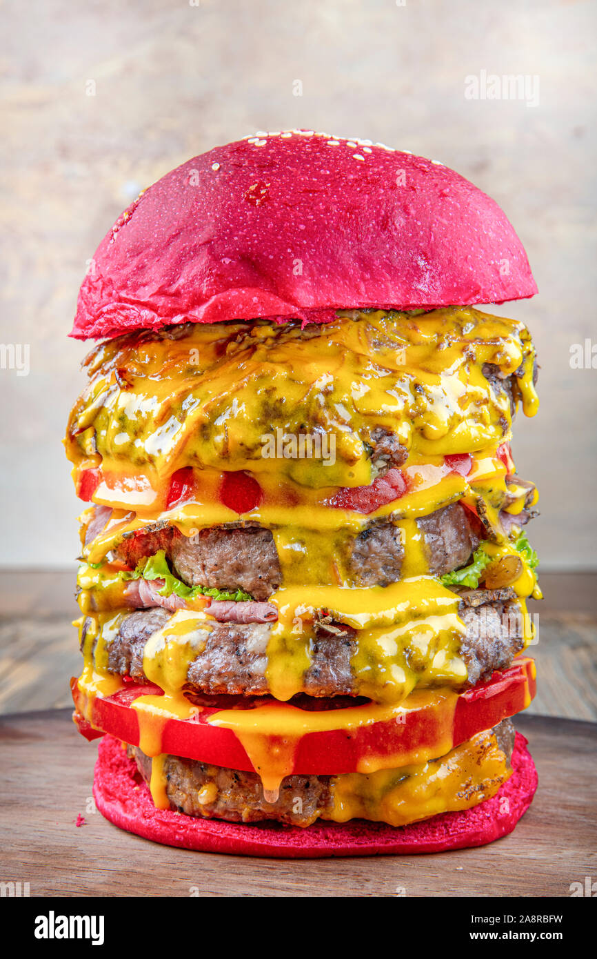 Red bread, burgers. American beefsteak big cheeseburgers. Trendy food ...