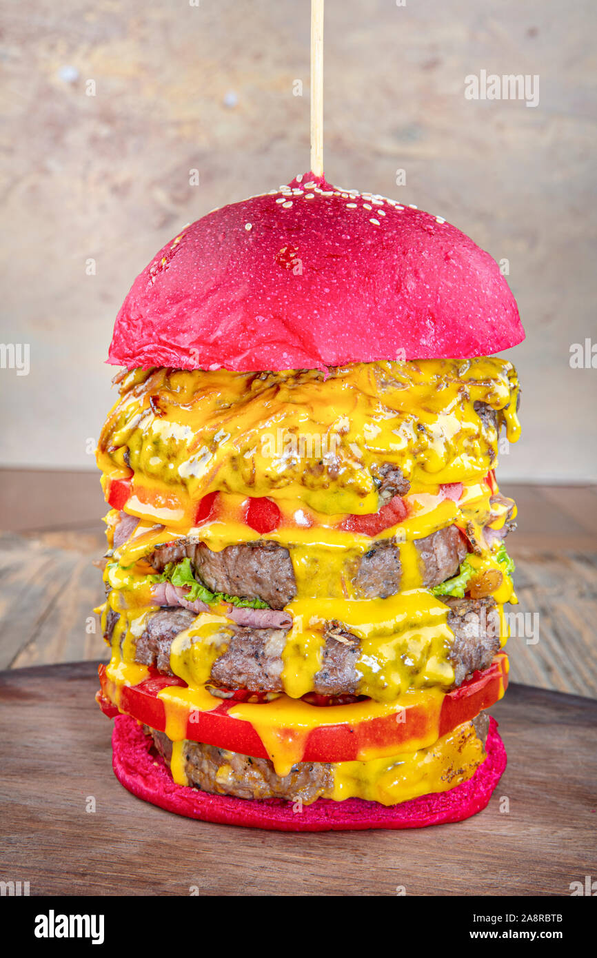 Red bread, burgers. American beefsteak big cheeseburgers. Trendy food ...