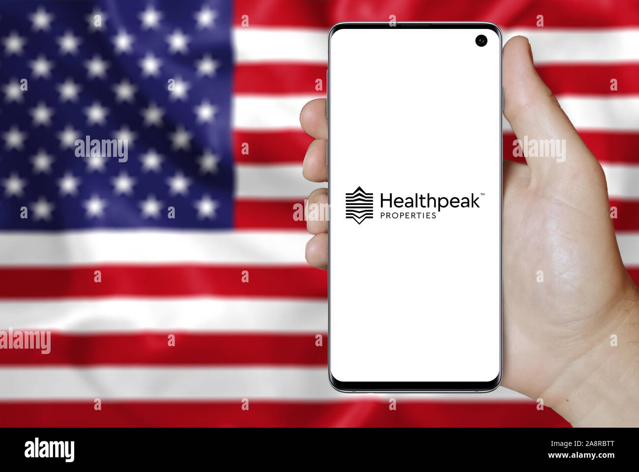 Logo of public company Healthpeak Properties displayed on a smartphone ...