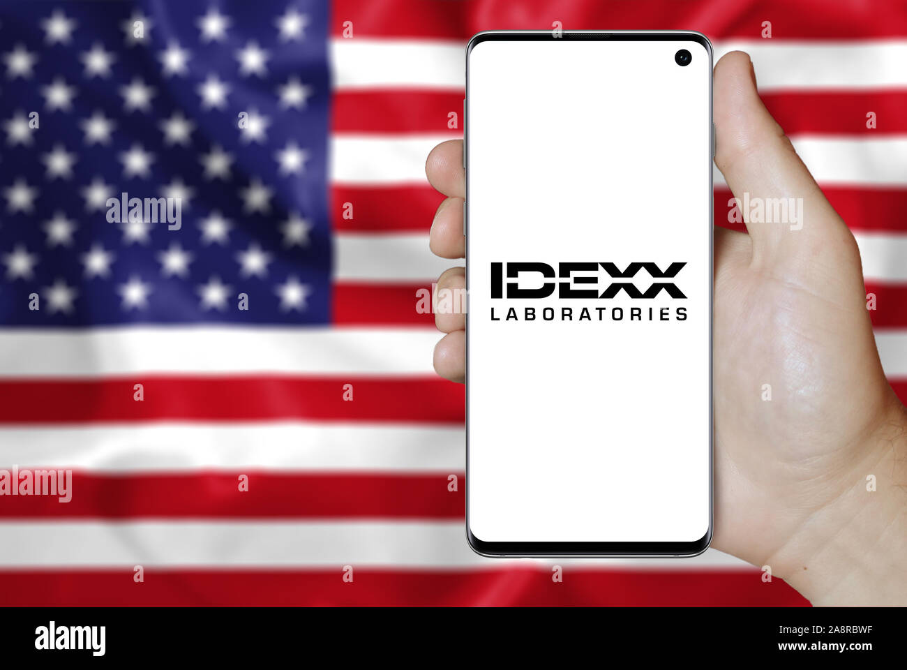 Logo of public company IDEXX Laboratories displayed on a smartphone ...