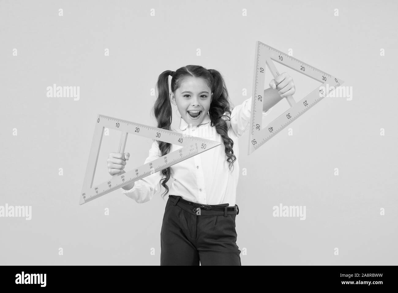 Child using ruler Black and White Stock Photos & Images - Alamy