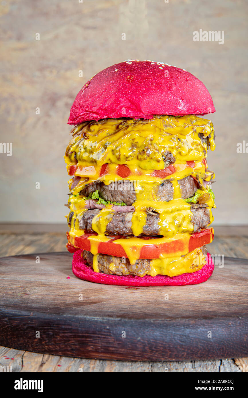 Red bread, burgers. American beefsteak big cheeseburgers. Trendy food ...