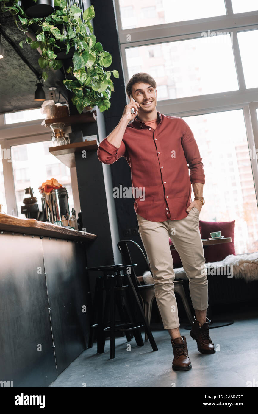 Handsome young man walking restaurant hi-res stock photography and ...