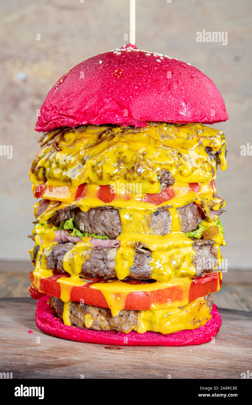 Red bread, burgers. American beefsteak big cheeseburgers. Trendy food ...