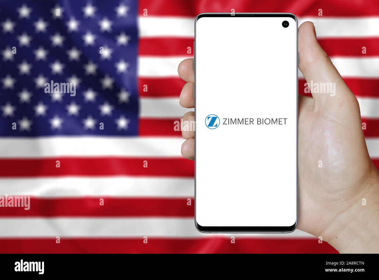 Logo of public company Zimmer Biomet Holdings displayed on a smartphone ...