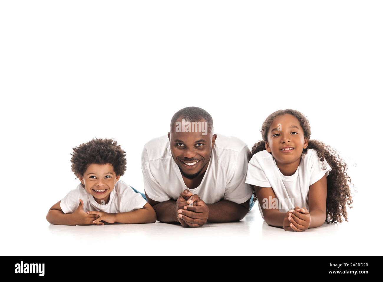 Happy African American Father Son And Daughter Smiling At Camera While