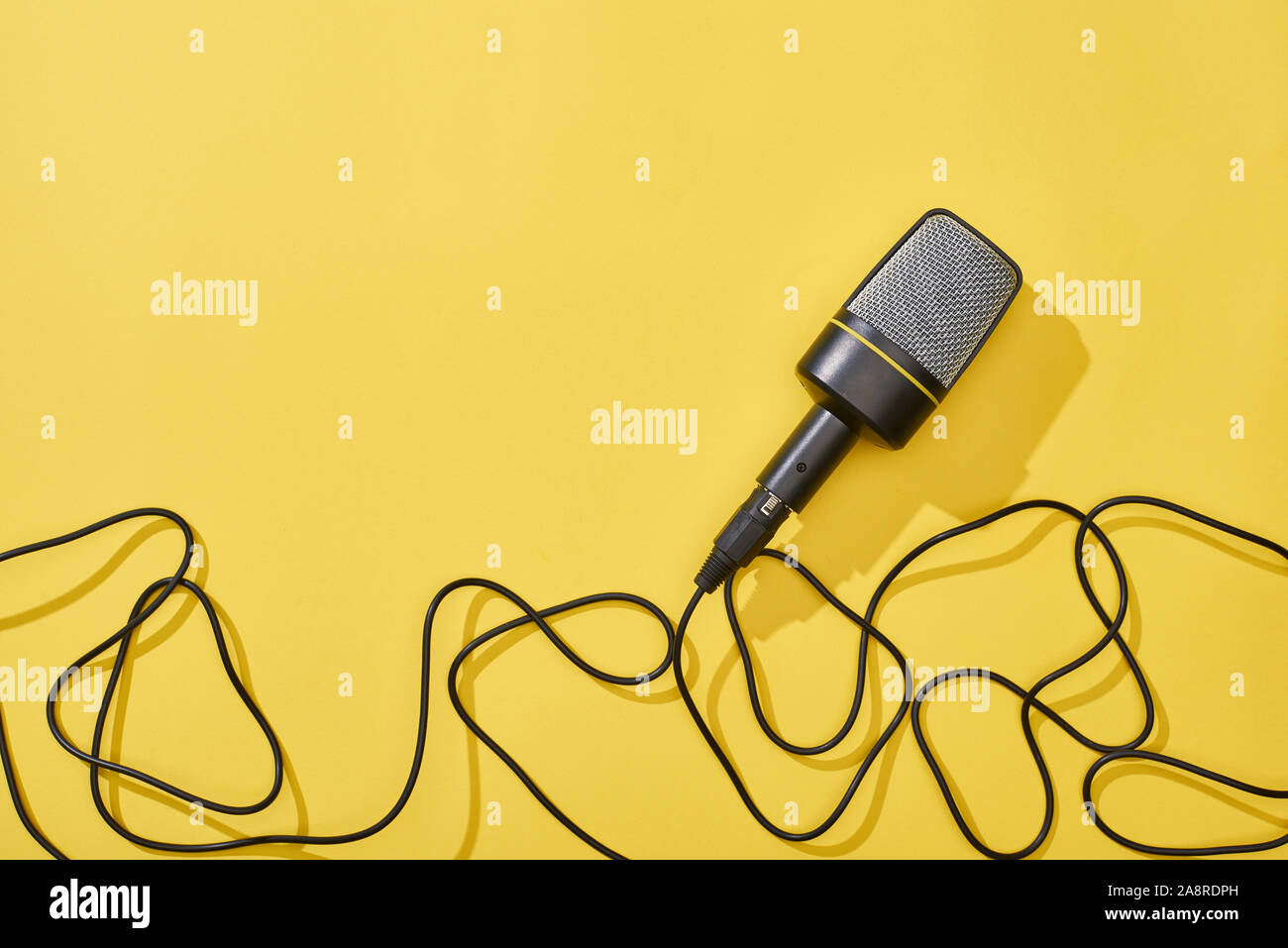 top view of microphone on bright and colorful background Stock Photo ...