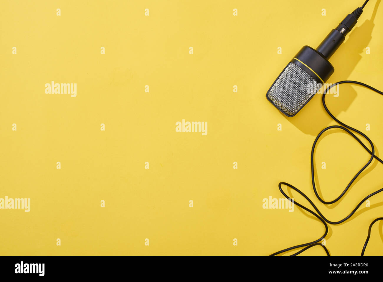 top view of microphone on bright and colorful background Stock Photo ...